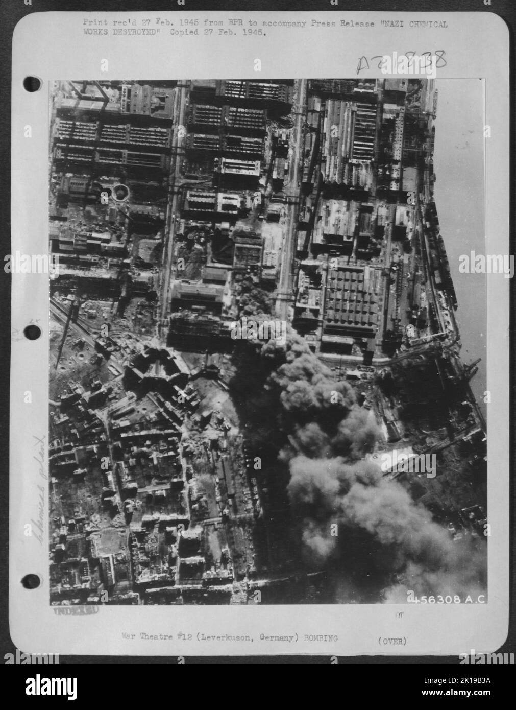 NAZI CHEMICAL WORKS DESTROYED--A billowing column of black smoke arises ...