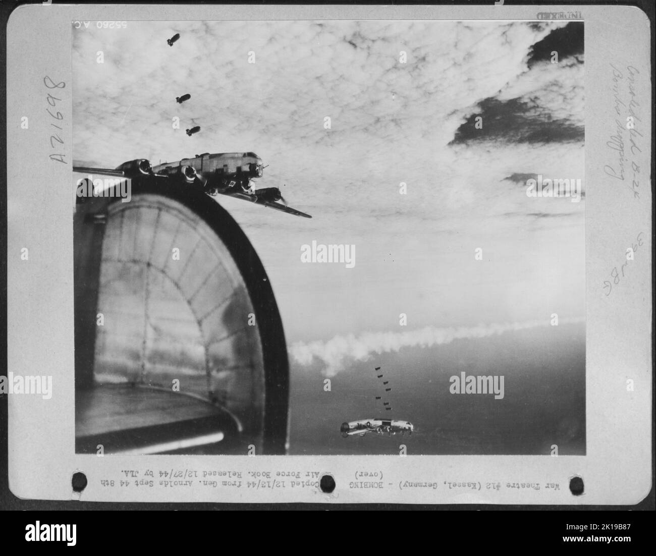 Consolidated B-24s bomb Kassel, Germany, tank plant on lead plane's ...