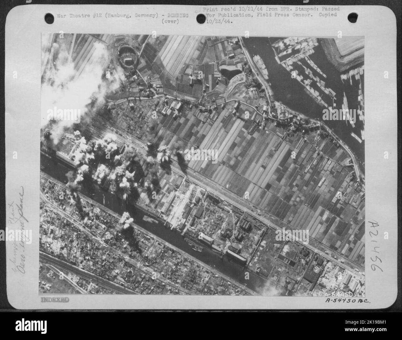 Bombs from the first wave of heavies partially cover the Klockner aero ...