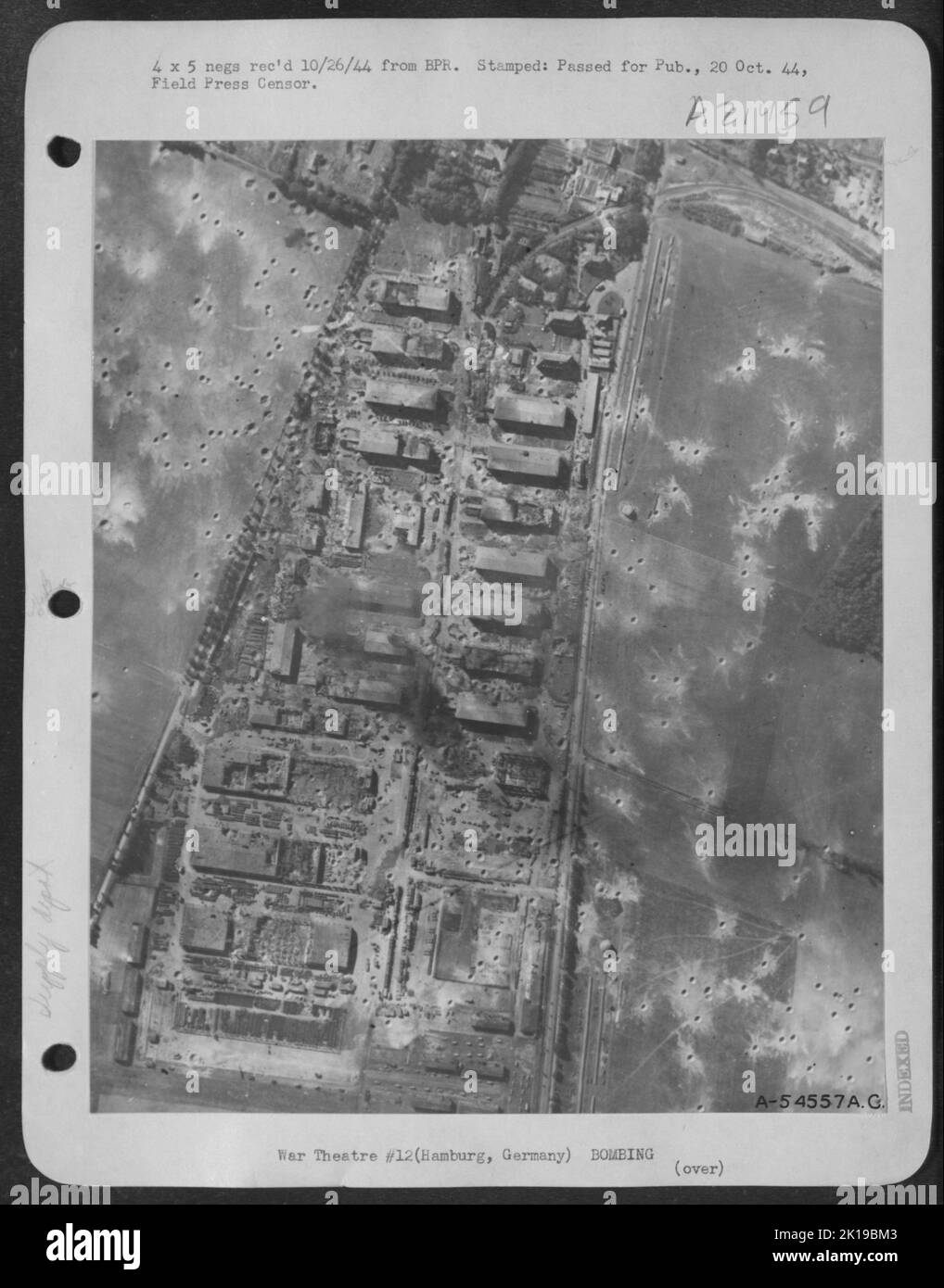 AFTER THE SMOKE CLEARED-Three large ordnance buildings almost ...