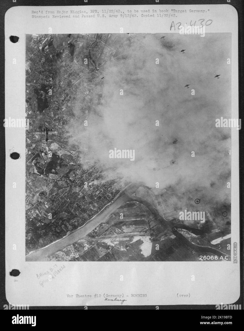 High over the smoke of fire started by the RAF the night before, Boeing ...