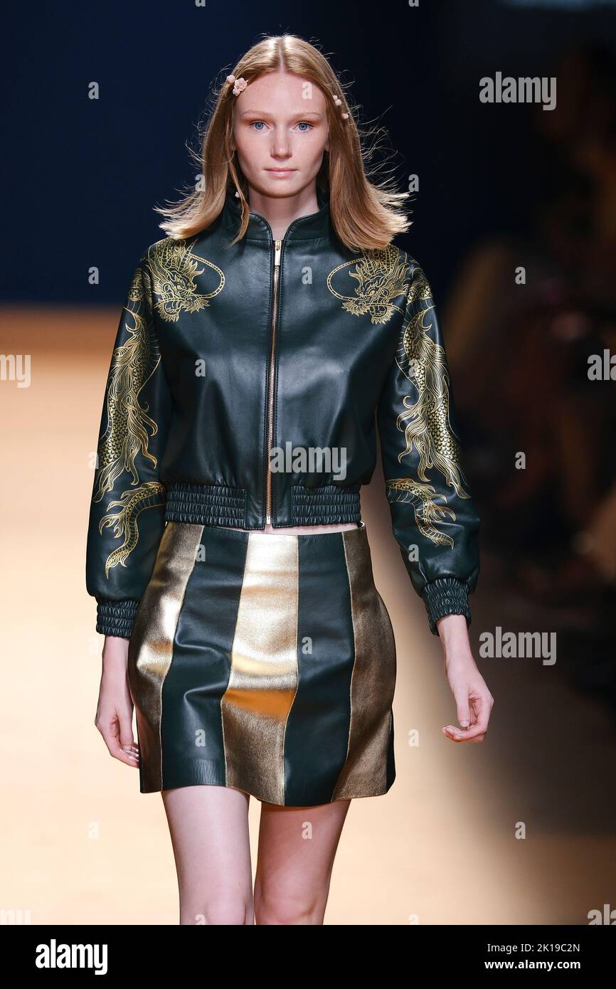 Madrid, Spain. 16th Sep, 2022. A model walks the runway wearing a ...