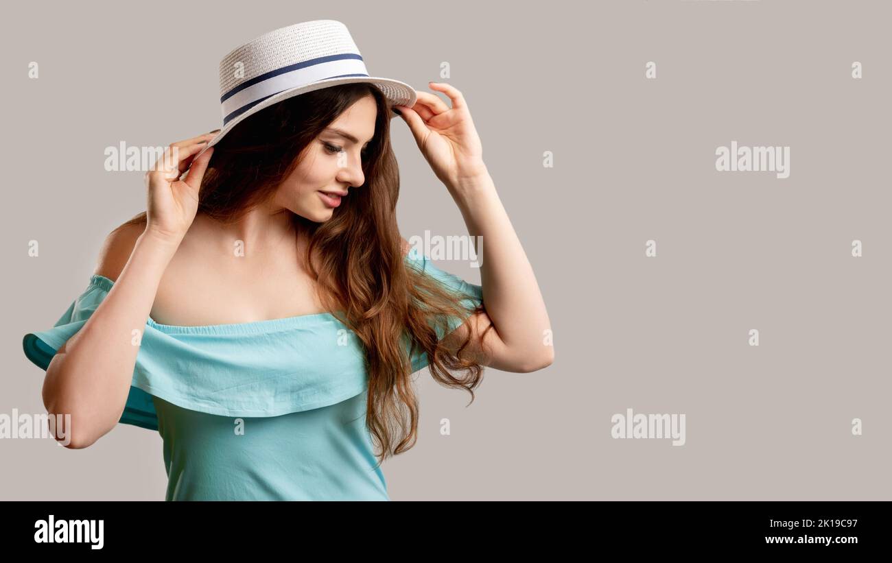 Summer look. Female elegance. Pretty smiling woman in off-the-shoulder ...