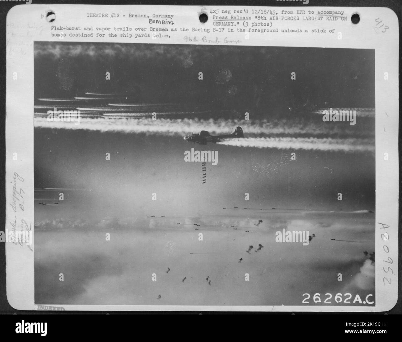 Flak-burst and vapor trails over Bremen as the Boeing B-17 in the ...