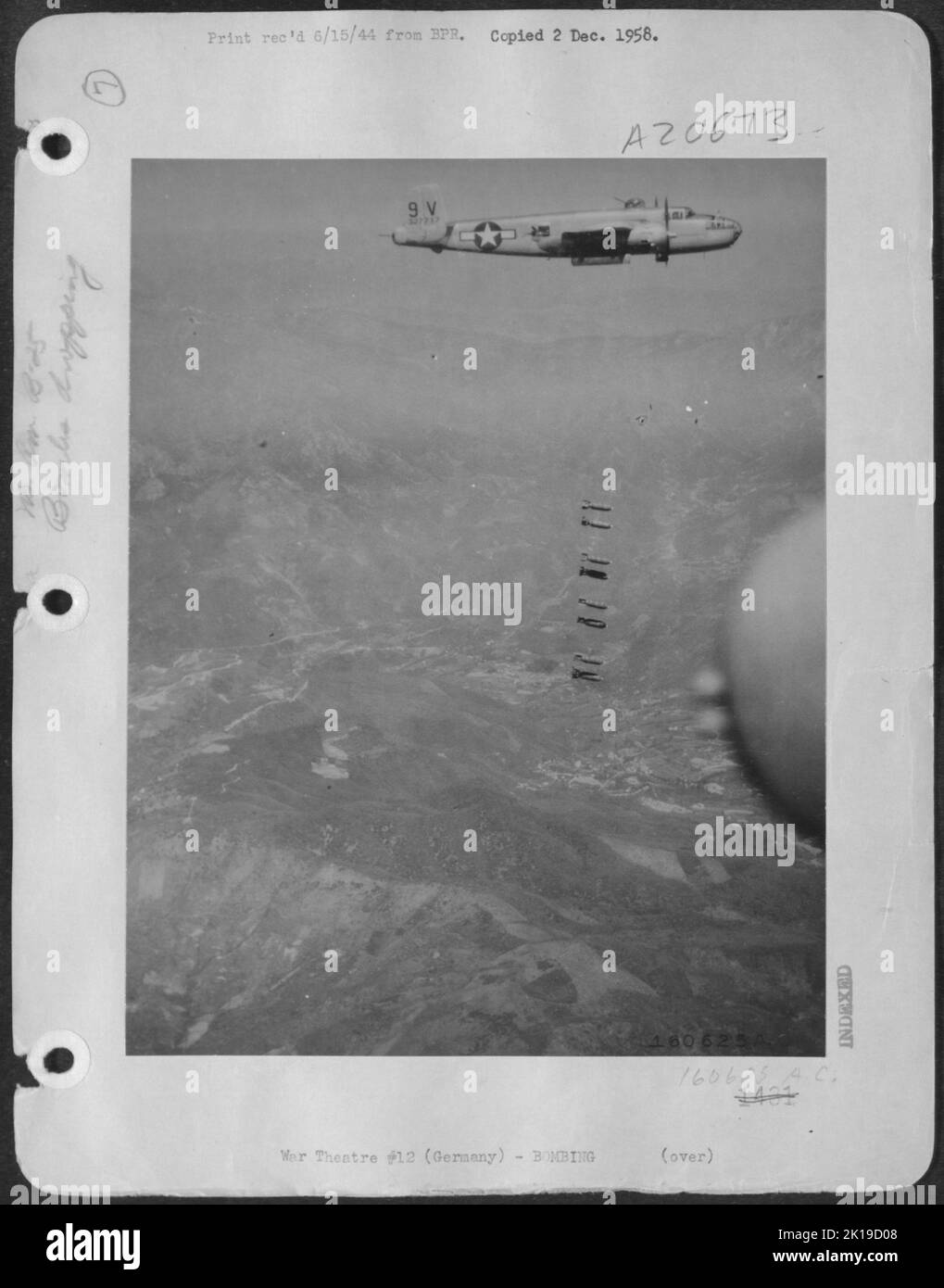 A North American B-25 Mitchell Bomber Released A String Of Bombs Over ...