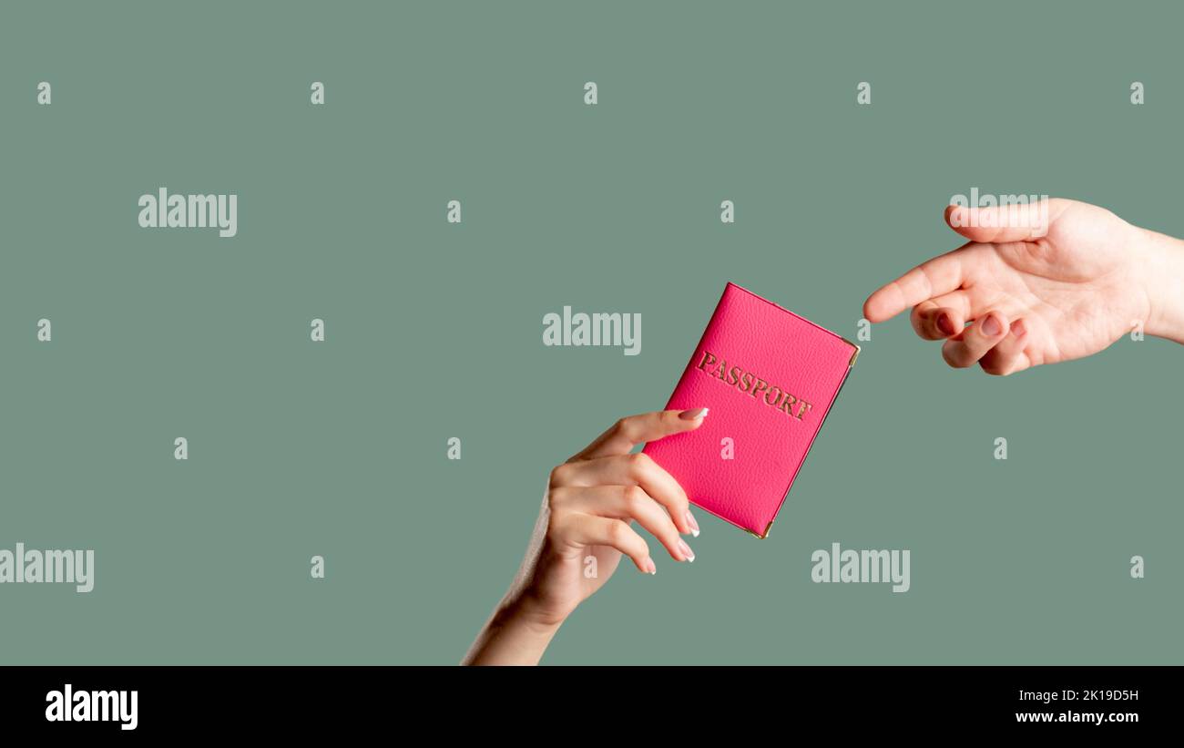 National identity. Visa center. Female hand giving foreign passport in ...