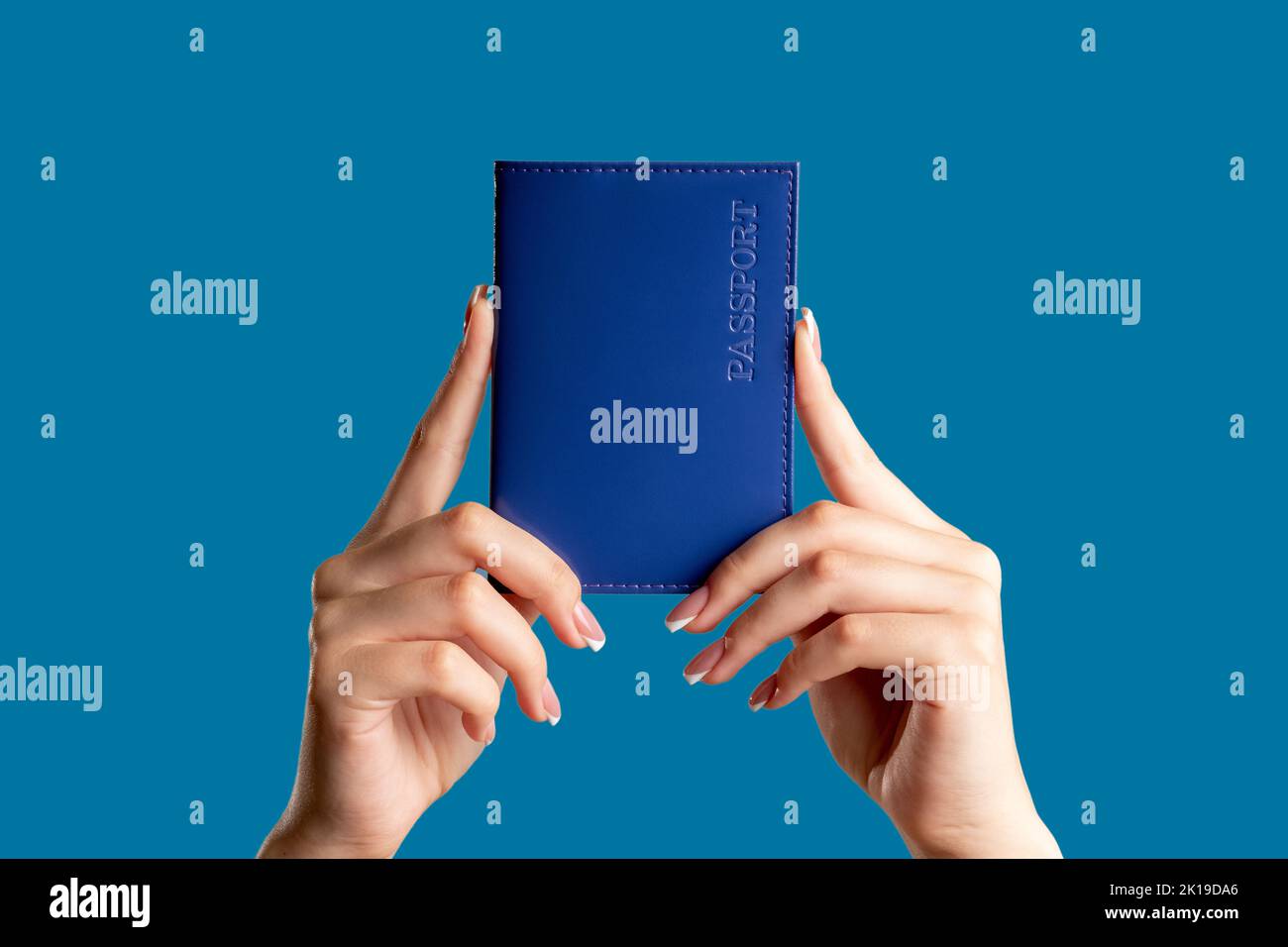 Passport service. Visa center. Female hands holding national id book in ...