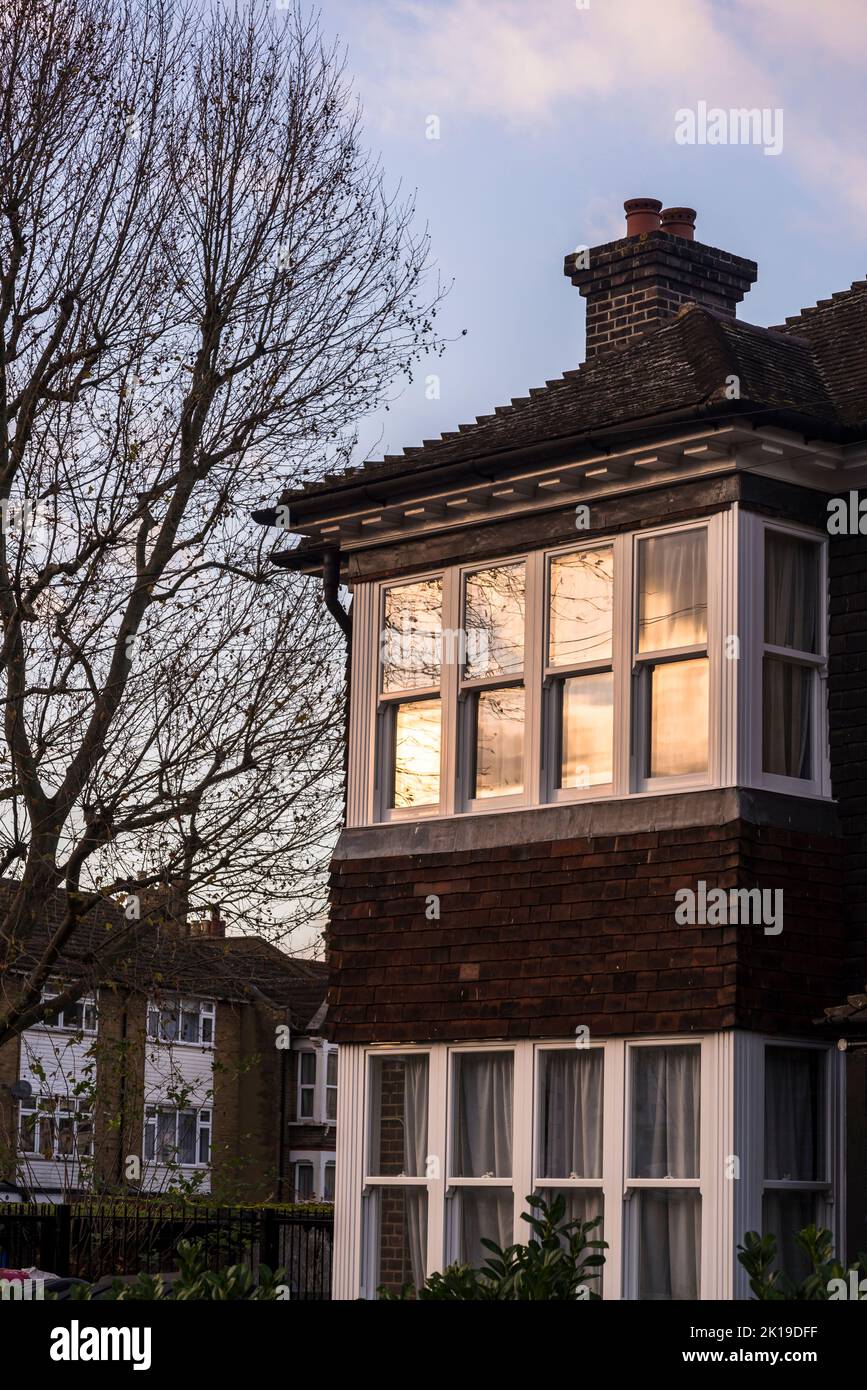 Suburban house with sunlit windows, Walthamstow, London, England, UK ...