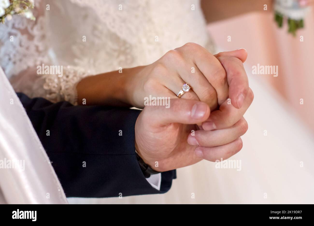 Wedding concept (Young married couple holding hands, ceremony wedding ...