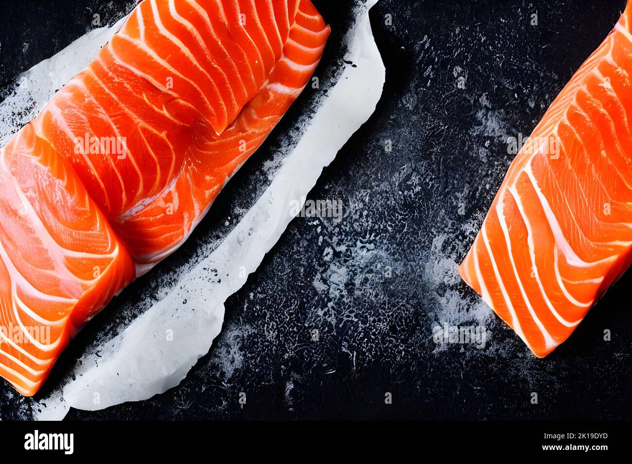 A top view of the raw red salmon fillets on the black background Stock ...
