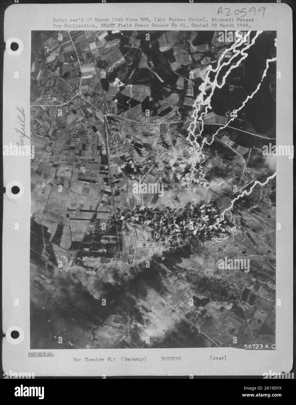 BURNING LUFTWAFFE BASE--While black smoke pours from the hangars of ...