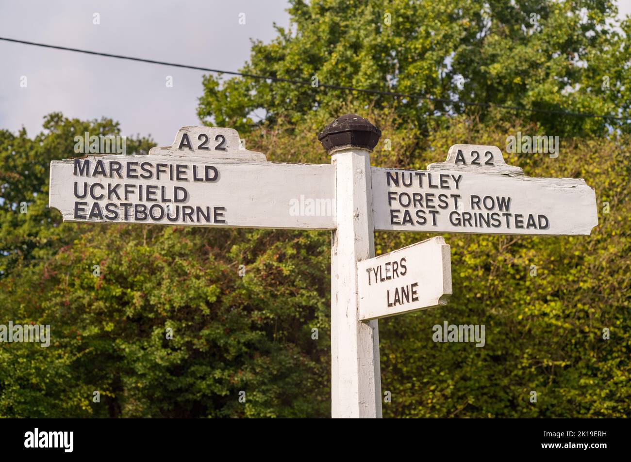 Various sign posts giving directions to holiday accommodation and ...