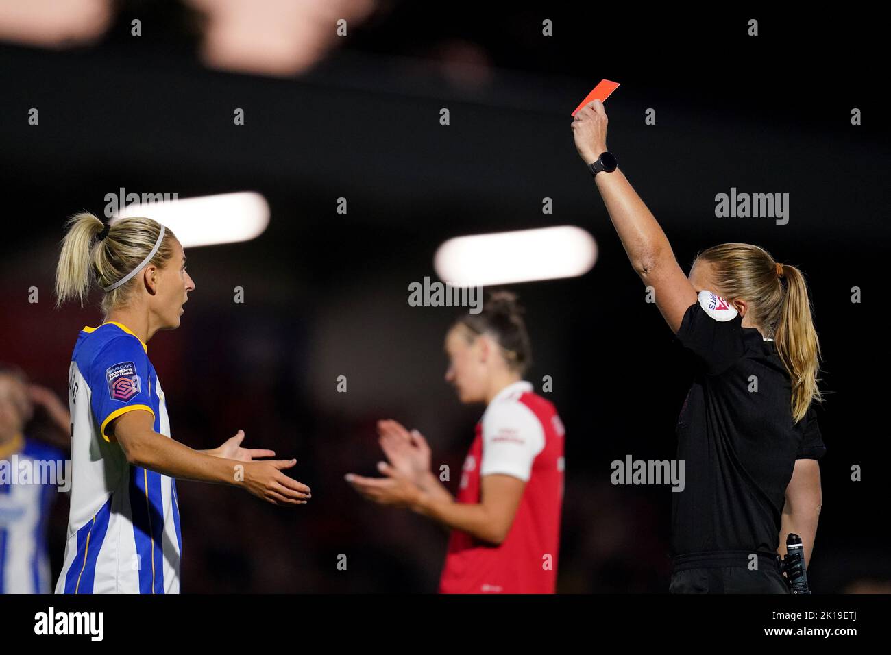 Brighton's Emma Kullberg is shown a red card during the Women's Super ...