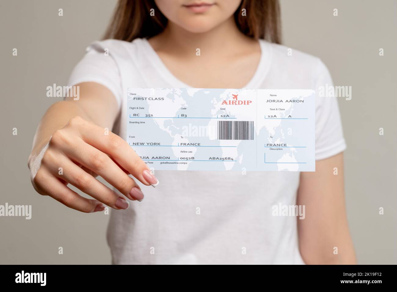 Boarding pass. Airport check-in. Female tourist showing American ...