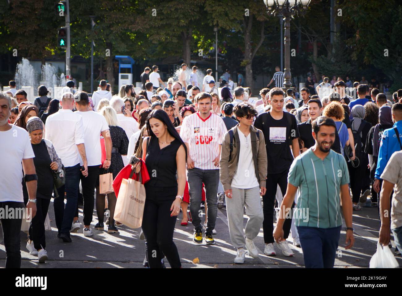 People are seen crossing the street in Ankara City. (Photo by Tunahan ...
