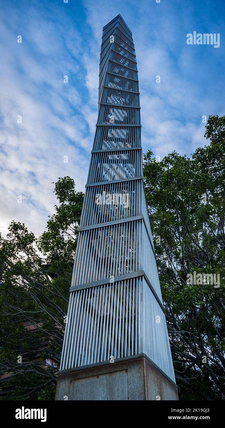 A vertical low angle shot of a turning steel tower in Sydney, Australia ...