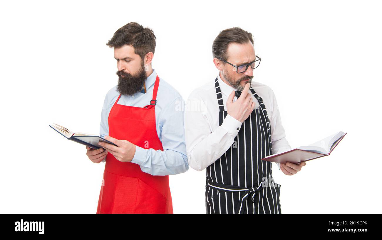 How to cook. Men bearded hipster cook apron reading books about ...