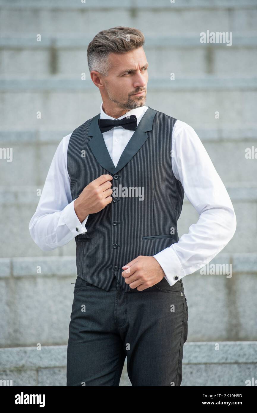 grizzle elegant man in bowtie. grizzled man in formalwear. tux man ...