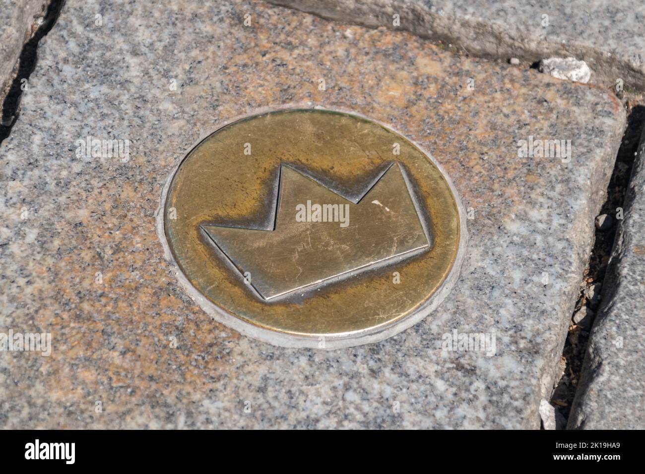 Bratislava, Slovakia - May 31, 2022: Crown symbol on the pavement in ...