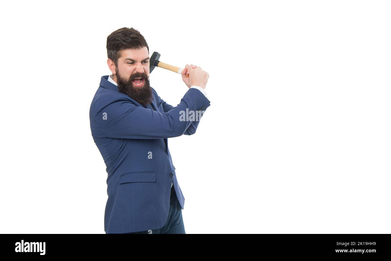 Angry businessman holding hammer studio. Businessman shouting in anger ...