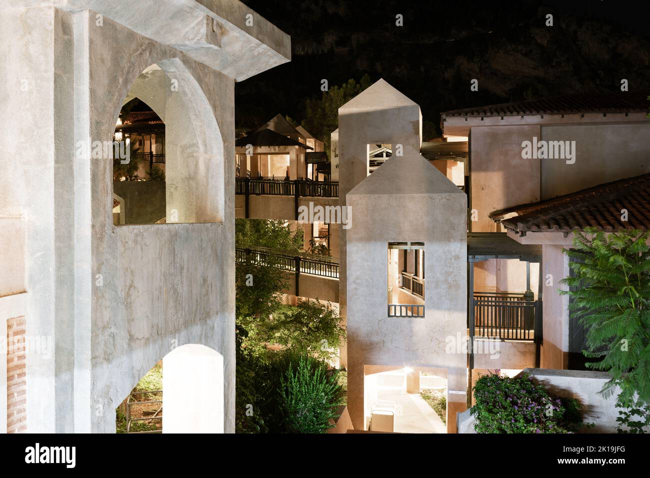 Beautiful hotel building with small balconies on it Stock Photo - Alamy