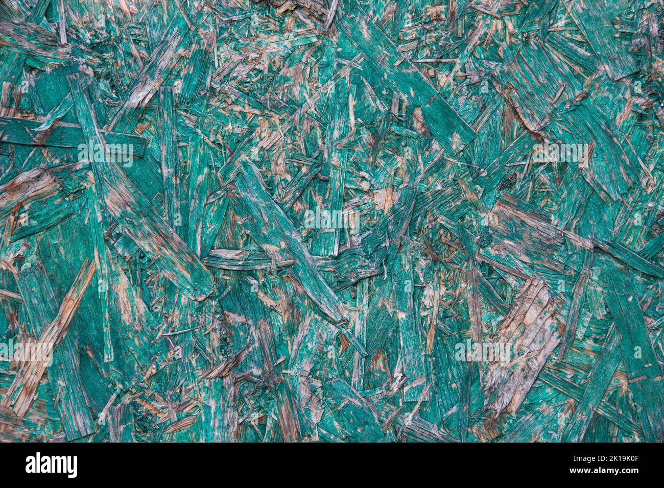 Pressed blue wood chipboard background pattern texture Stock Photo - Alamy