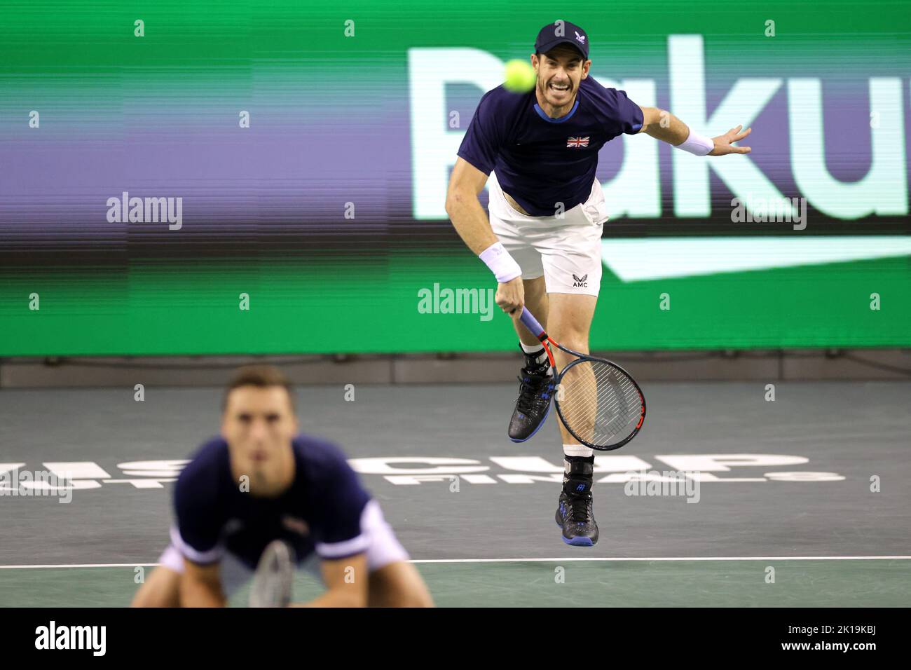 Great Britain's Andy Murray (right) serves with Joe Salisbury against ...