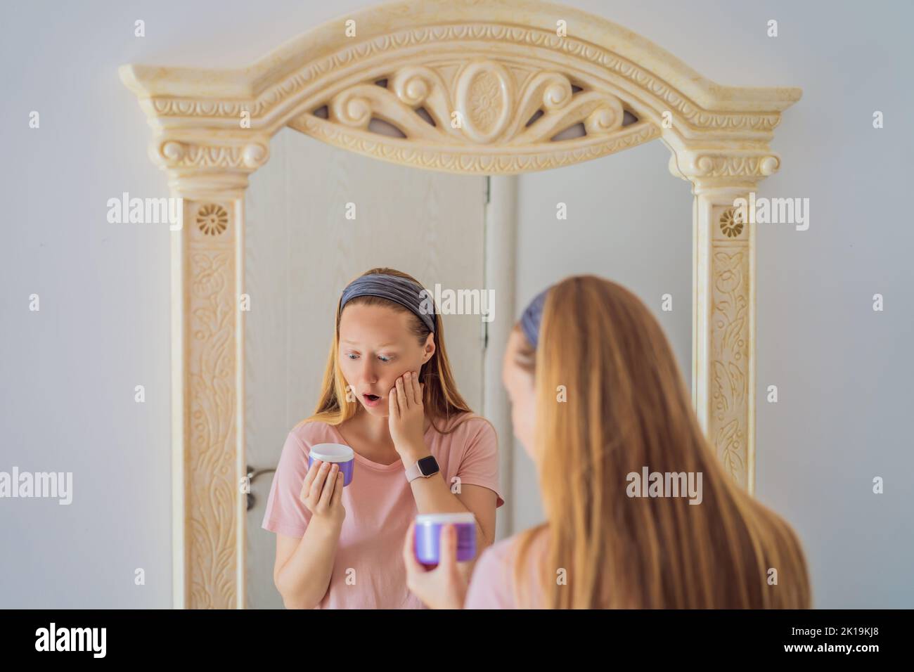 Happy girl excited with cosmetic effect of beauty care product ...