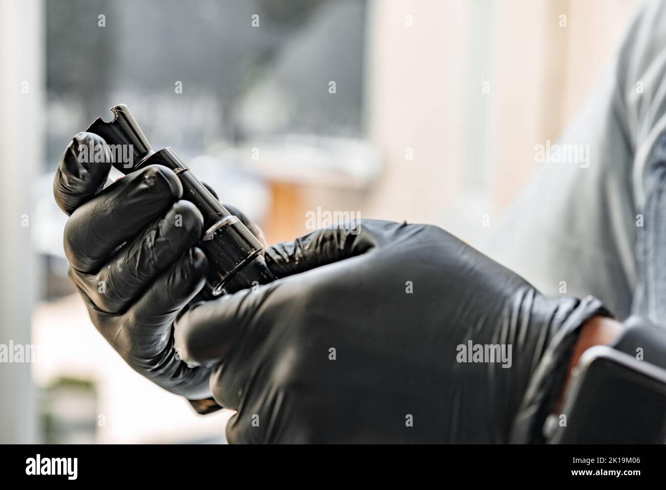 The gunsmith maintaining his rifle in a workshop Stock Photo - Alamy