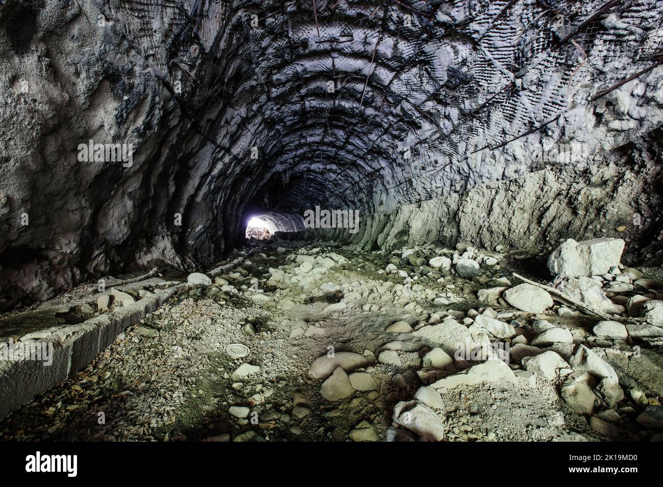 Dark dirty collapsed road tunnel Stock Photo - Alamy