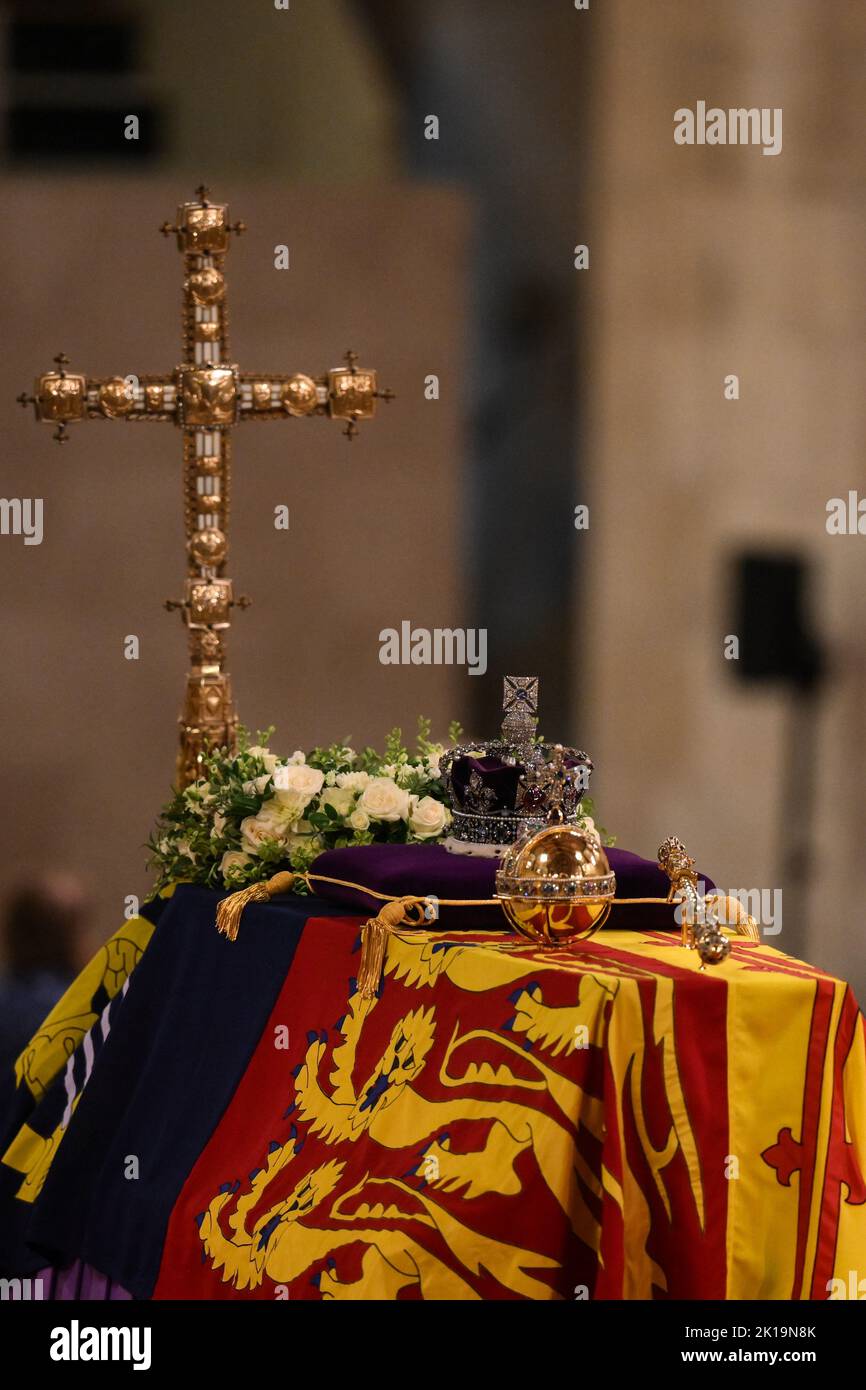 The coffin of Queen Elizabeth II, draped in the Royal Standard with the ...