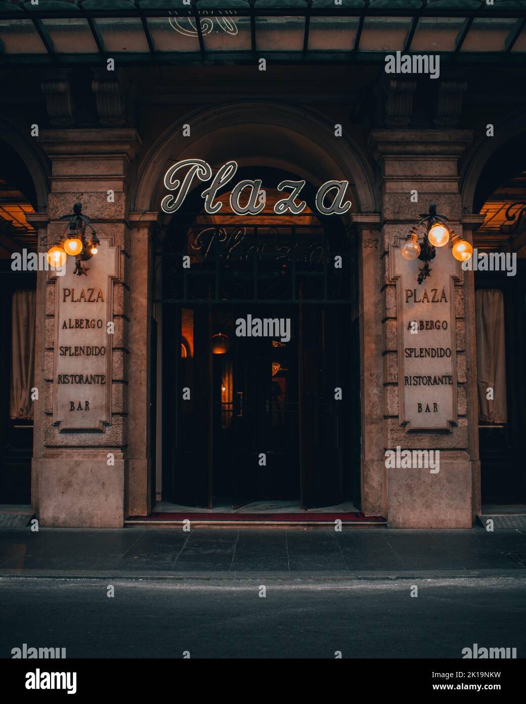 The facade sign of the Grand Plaza Rome Hotel at night, vertical shot ...