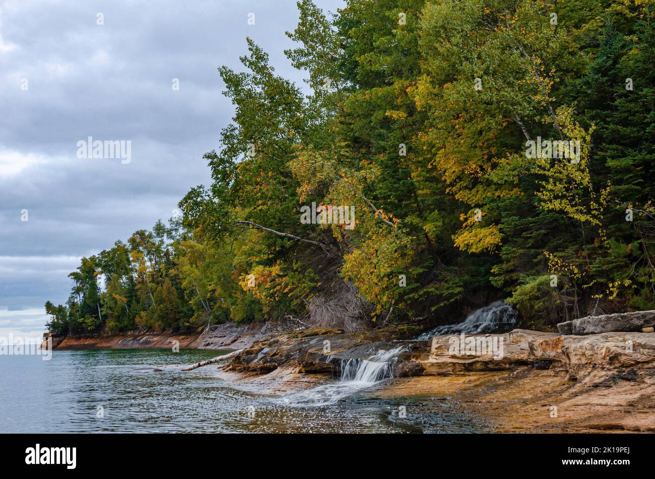 Miner's Falls tumbles out of the forest into Lake Superior in Pictured ...