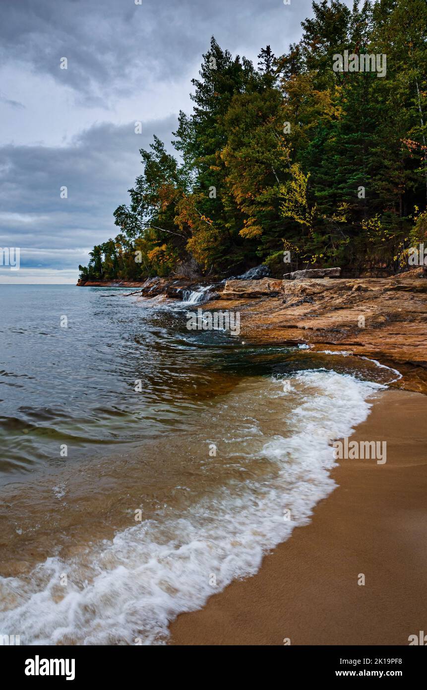 Early color shows in the forest abover Miners Beach Falls on the Lake ...