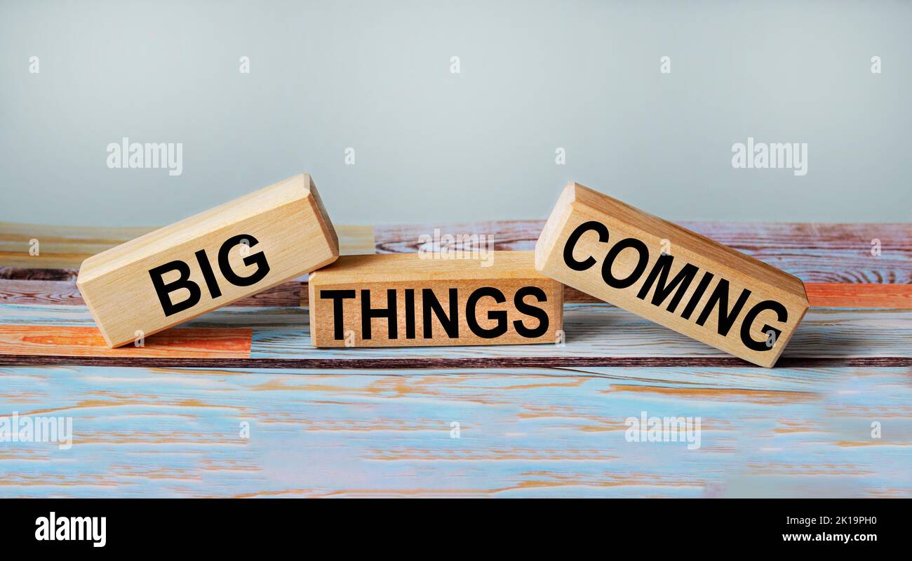BIG THINGS COMING text on wooden blocks and vintage background Stock Photo - Alamy