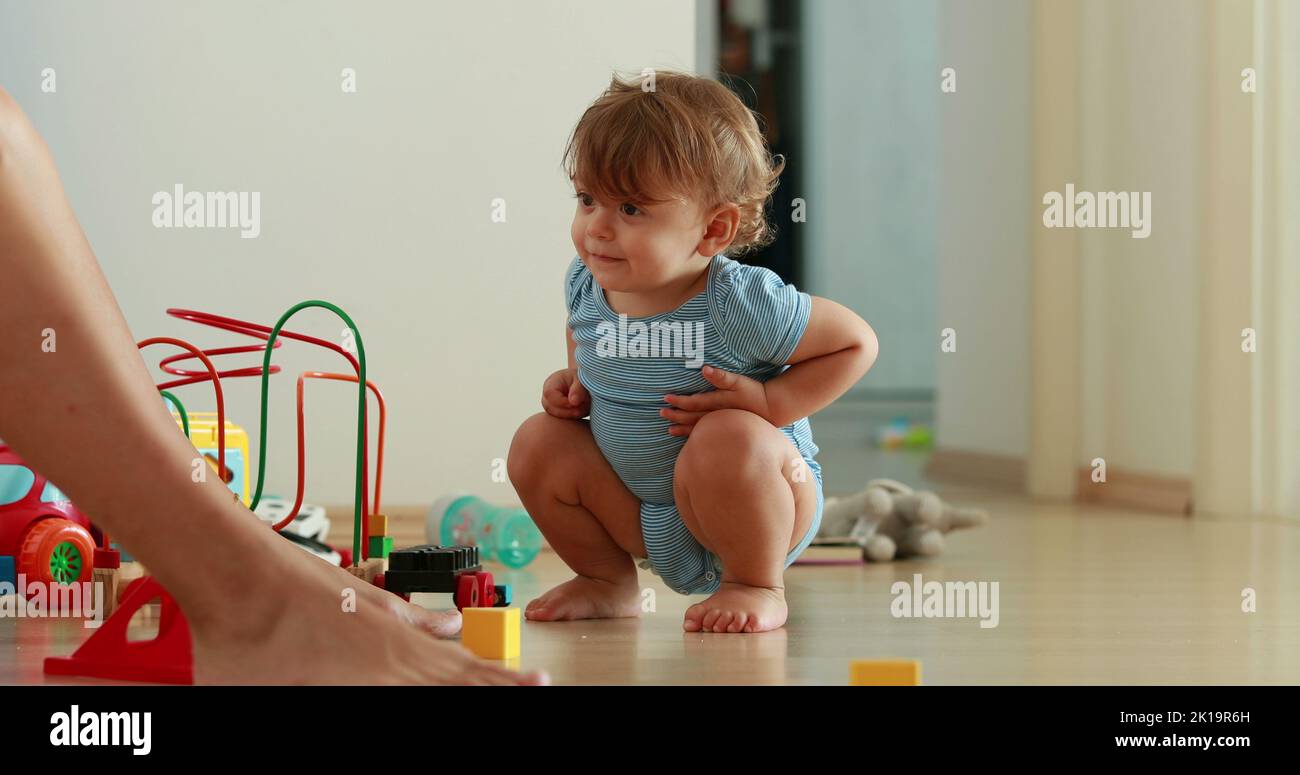 Baby paying attention, one year old infant toddler at home Stock Photo ...