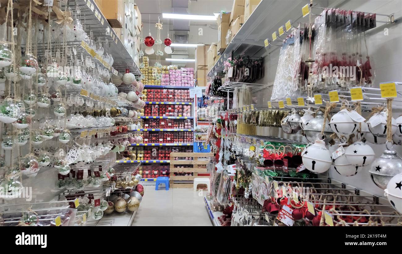 Christmas decorations and storefronts in the background at shopping ...