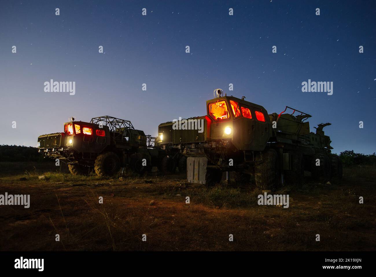 Old rusty broken Russian military vehicle at night Stock Photo - Alamy