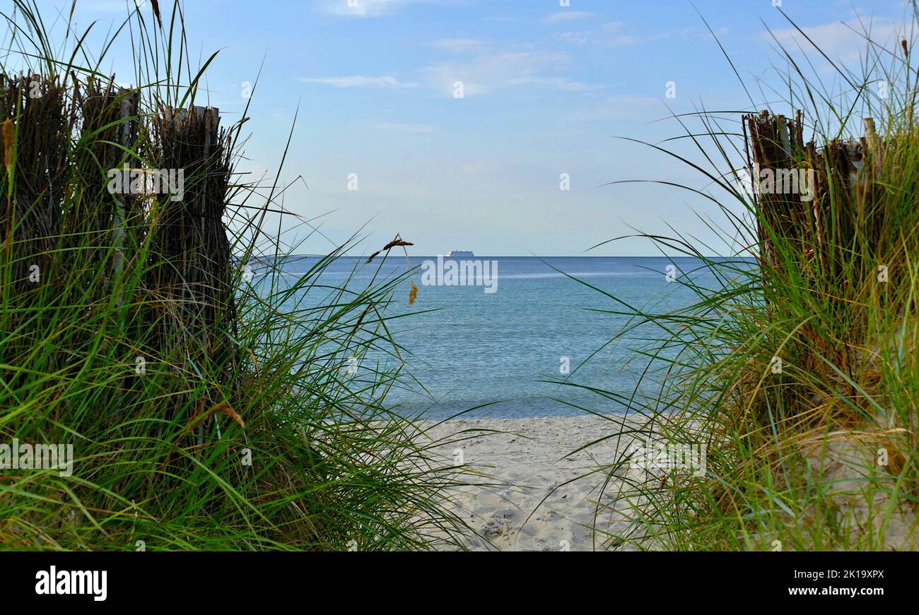 A sand beach view with a seascape Stock Photo - Alamy