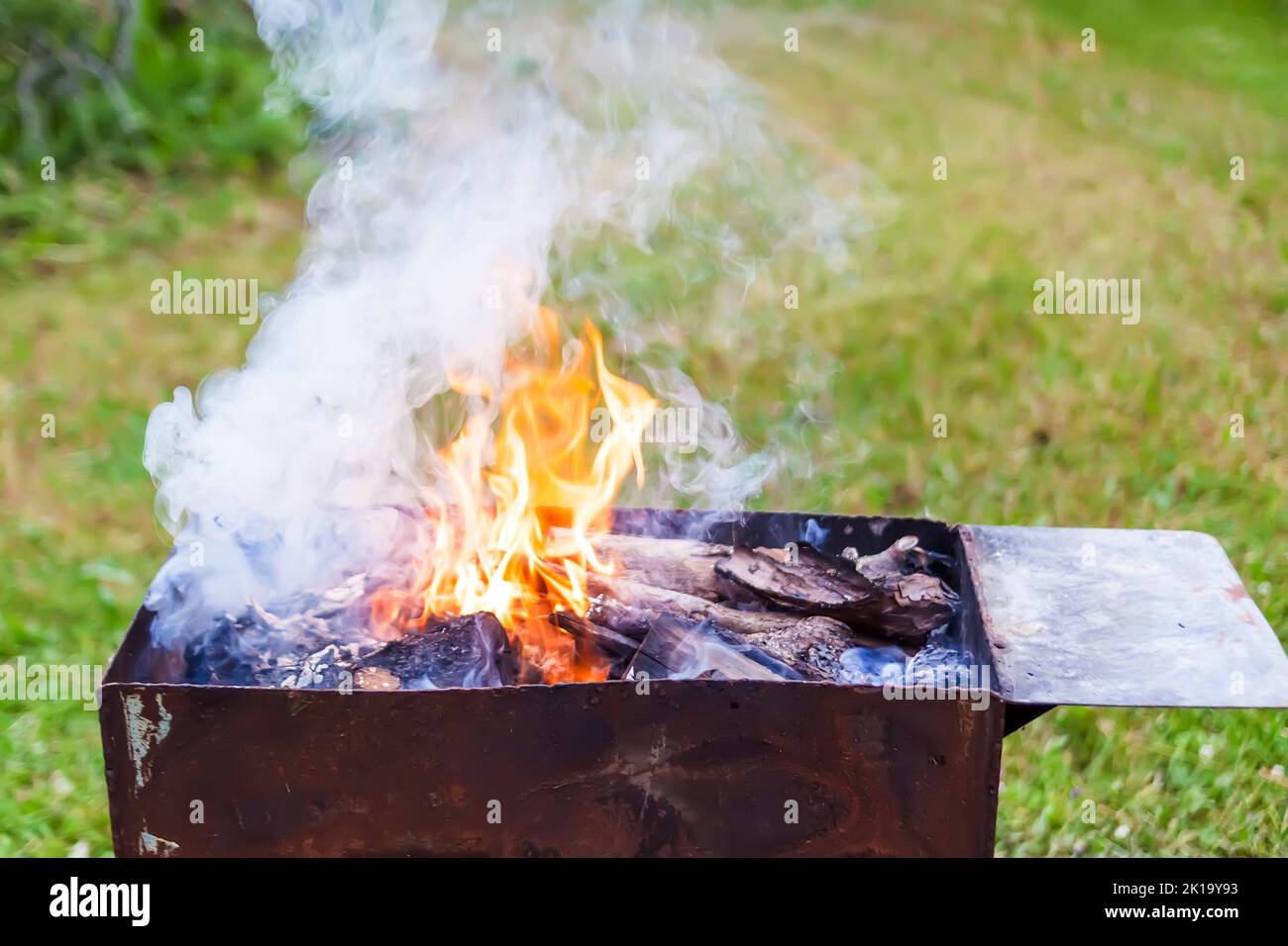 Flame of fire burning in the brazier Stock Photo - Alamy