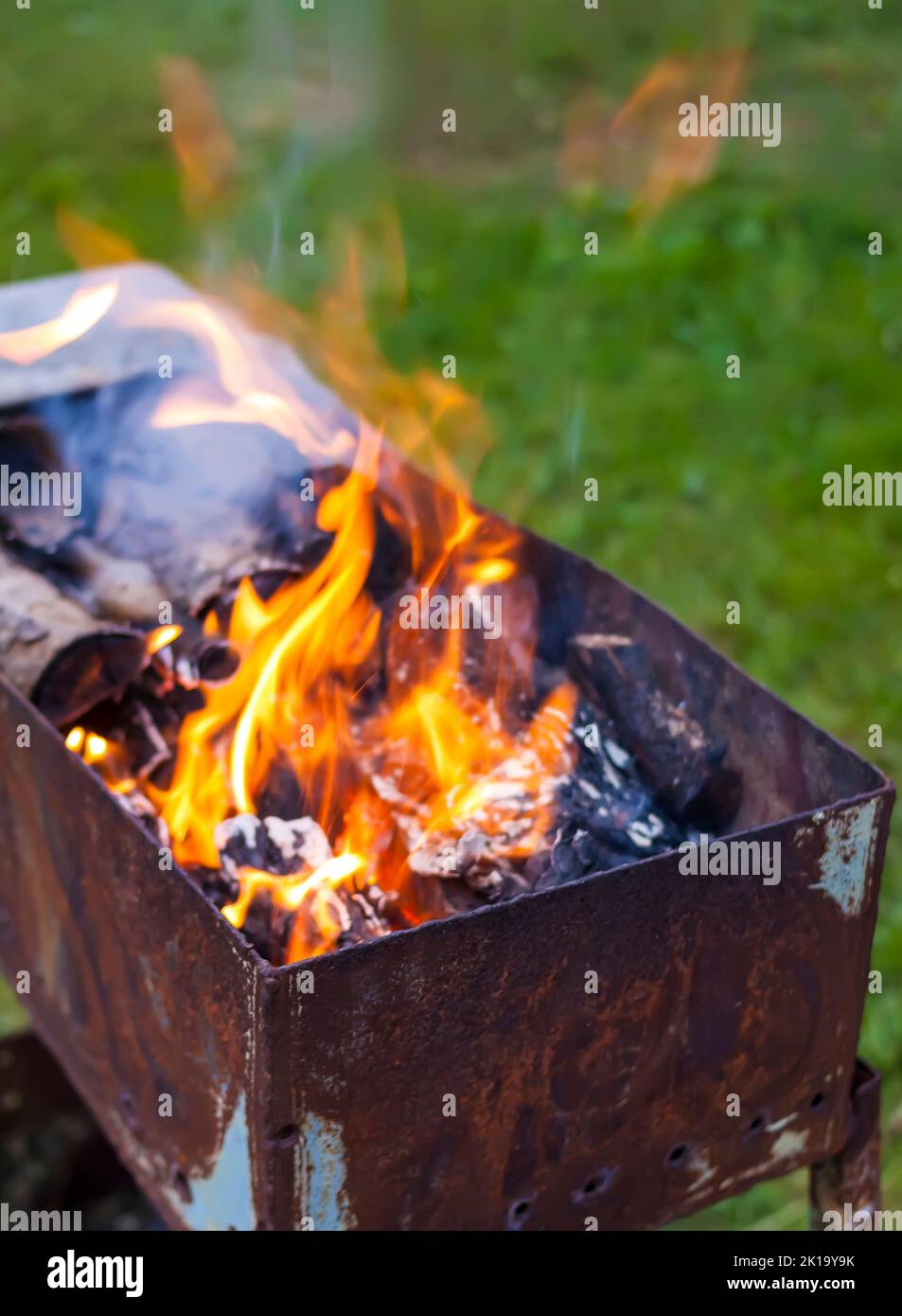 Flame of fire burning in the brazier Stock Photo - Alamy