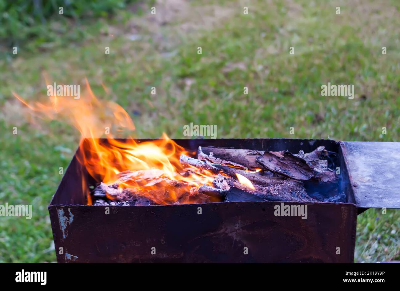 Flame of fire burning in the brazier Stock Photo - Alamy