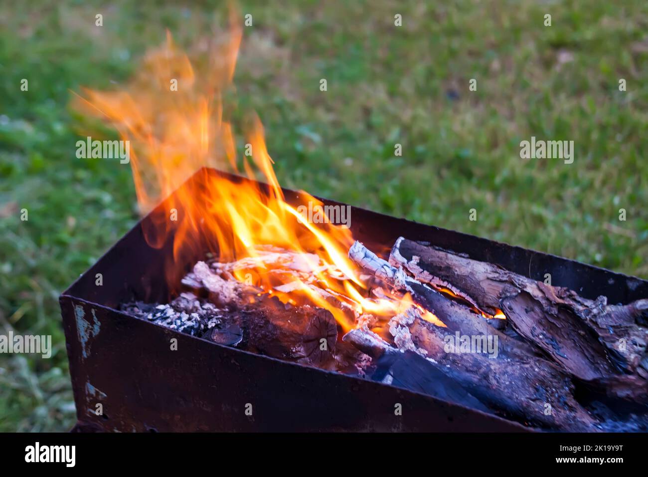 Flame of fire burning in the brazier Stock Photo - Alamy
