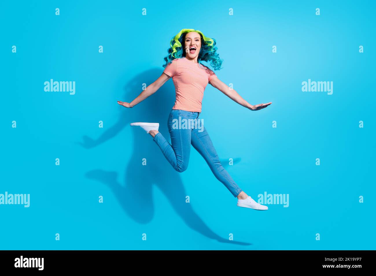 Full body image of energetic good mood lady jumping up enjoy warm ...