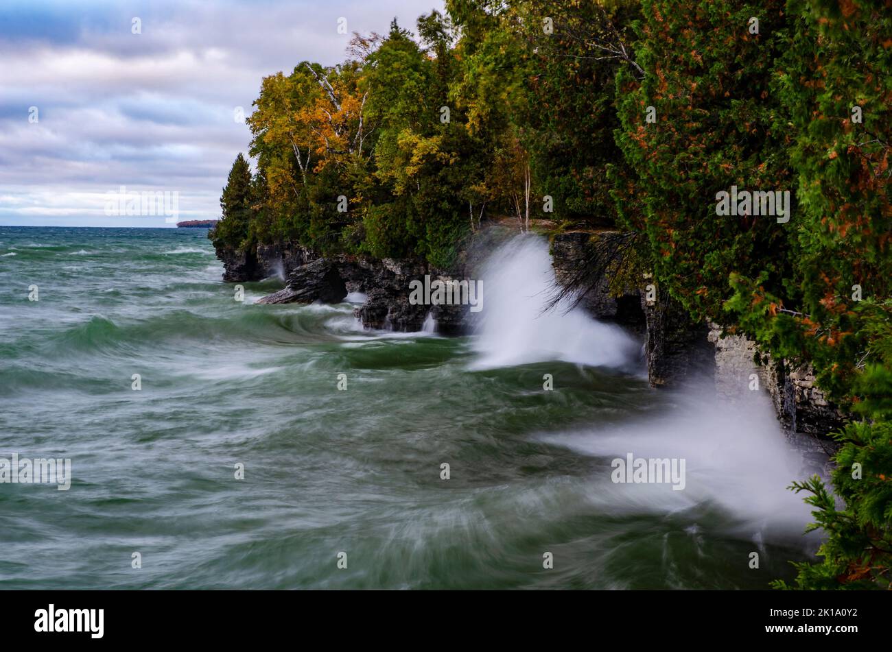 Giant rollers (waves) pound the Cave Point County Park Lake Michigan ...
