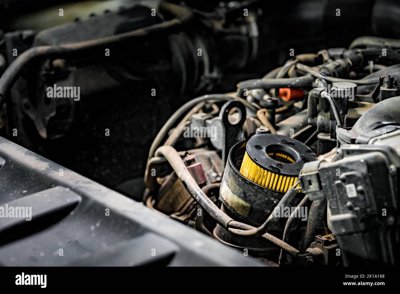 View of engine and other parts under the open hood of a car Stock Photo ...