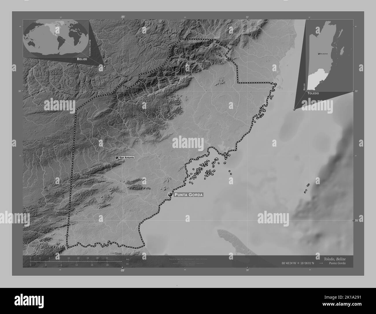 Toledo, district of Belize. Grayscale elevation map with lakes and rivers. Locations and names ...