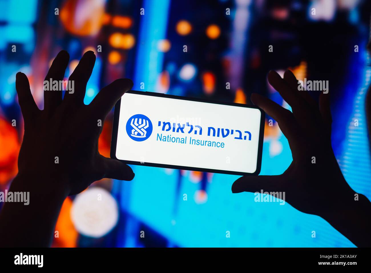 In this photo illustration, the Bituach Leumi logo is seen displayed on ...