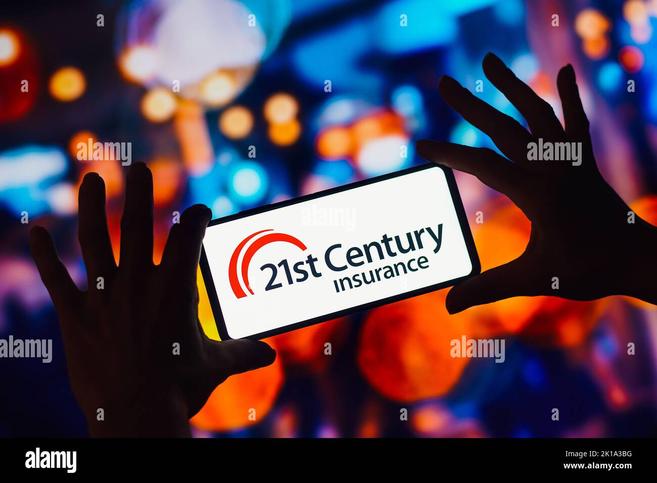 In this photo illustration, the 21st Century Insurance logo is seen ...