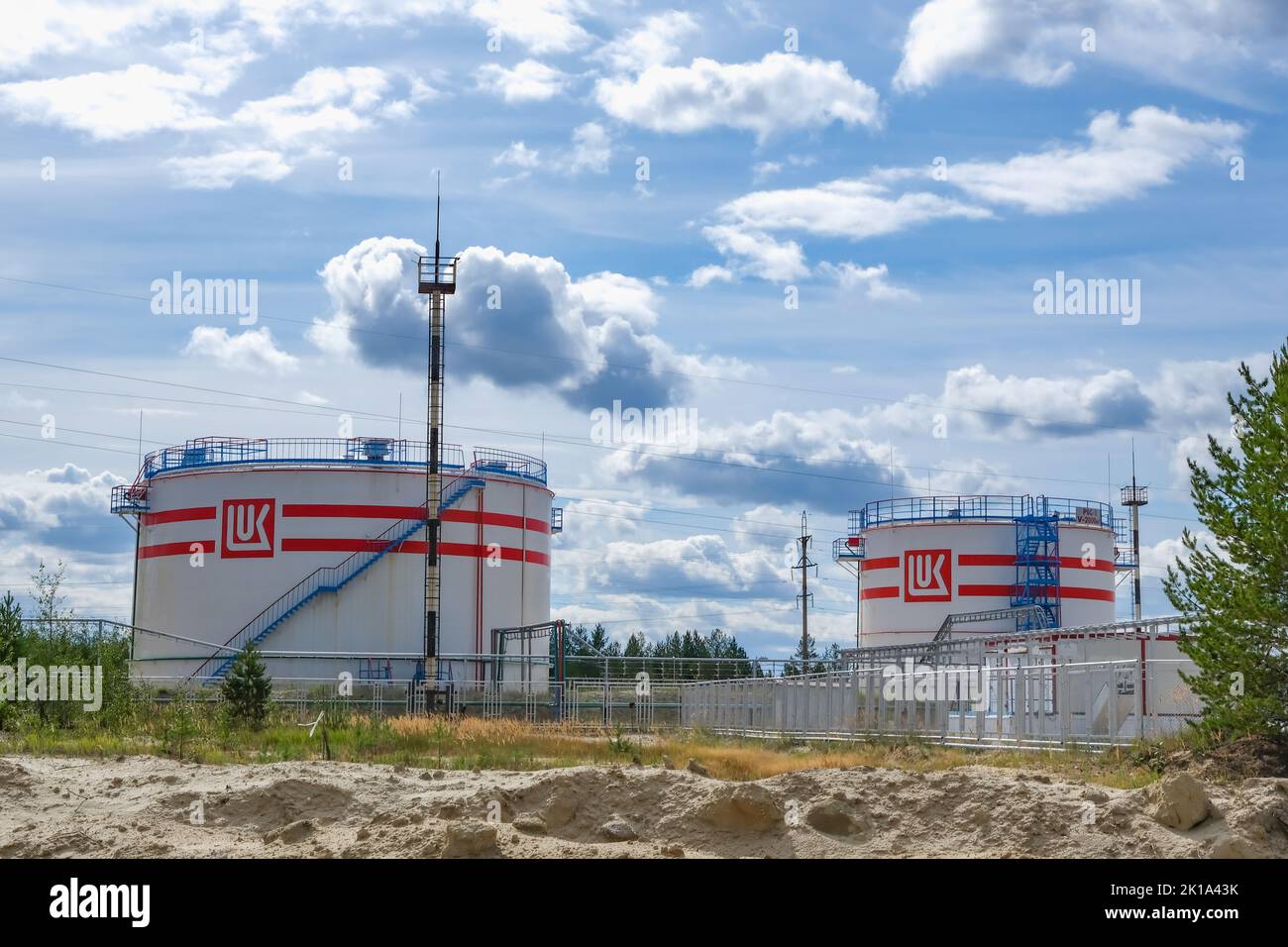Lukoil oil storage tanks against the sky. Uray, Russia, August 2022 ...